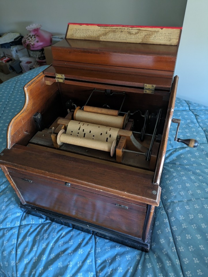 Vintage Mandolina paper roller organ; with four music rolls; needs new ...