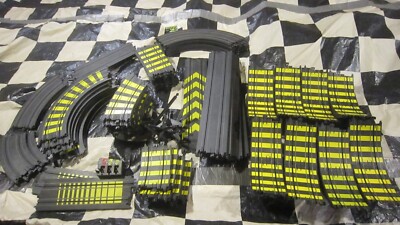 80 Piece Lot Of Tyco Slot Car Track,Straight,Curve,Banked,Cliff Hanger ...