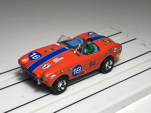 Video READ Aurora T-Jet modified 'Hot' chassis - Custom AC Cobra body ...