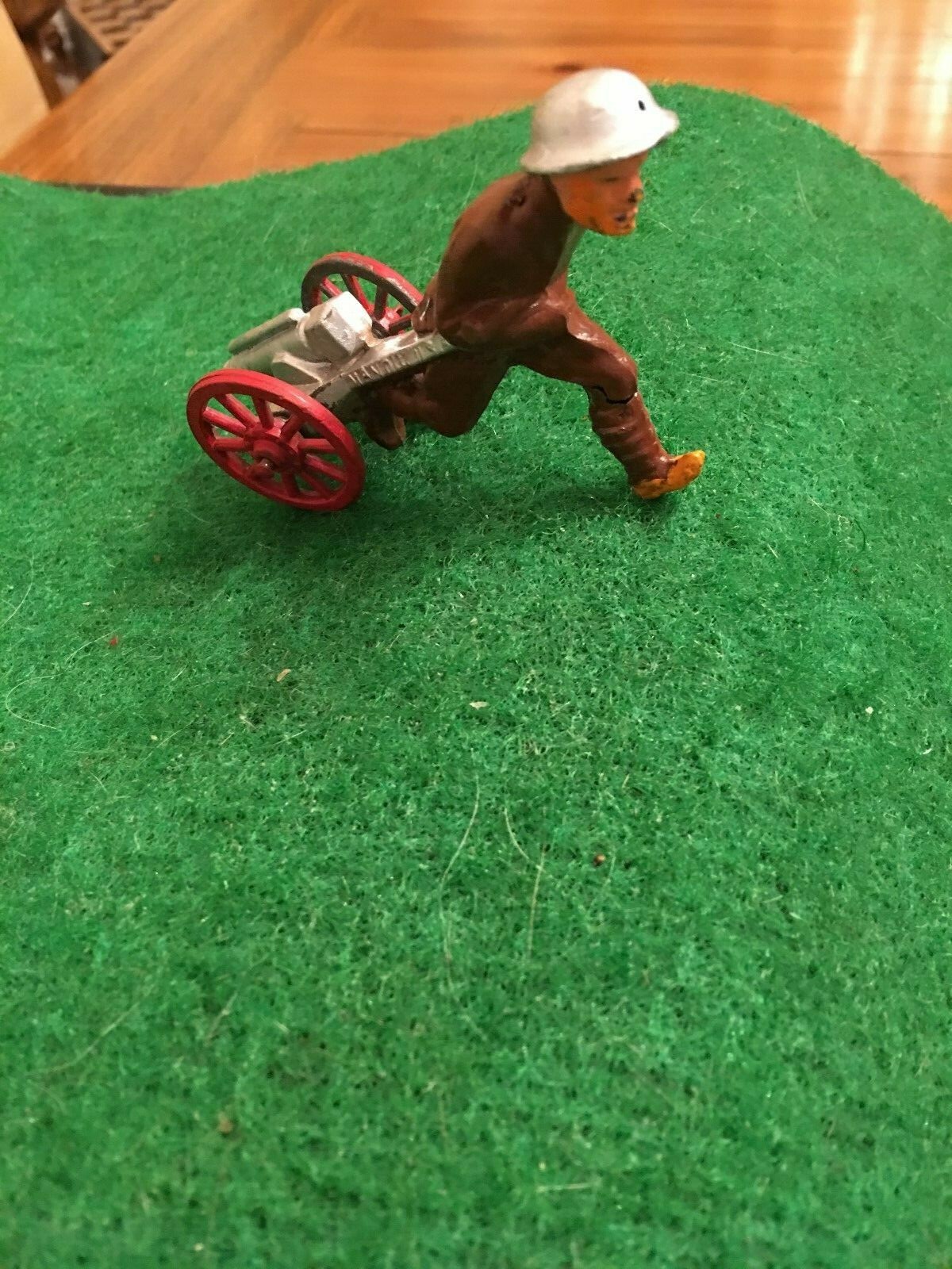 SOLDIER PULLING CANNON WITH METAL WHEELS; "MINTY CONDITION" SAME DAY ...