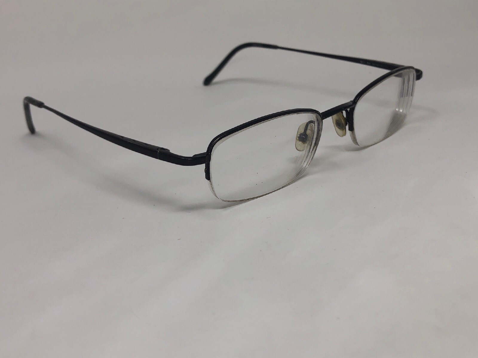 MAGIC CLIP M252 Eyeglasses Frame Half Rimless Petite 49-20-140 Gunmetal ...