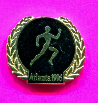1996 OLYMPIC PIN RUNNER PIN GOLD WREATH RUNNER PIN BLACK BACKGROUND ...