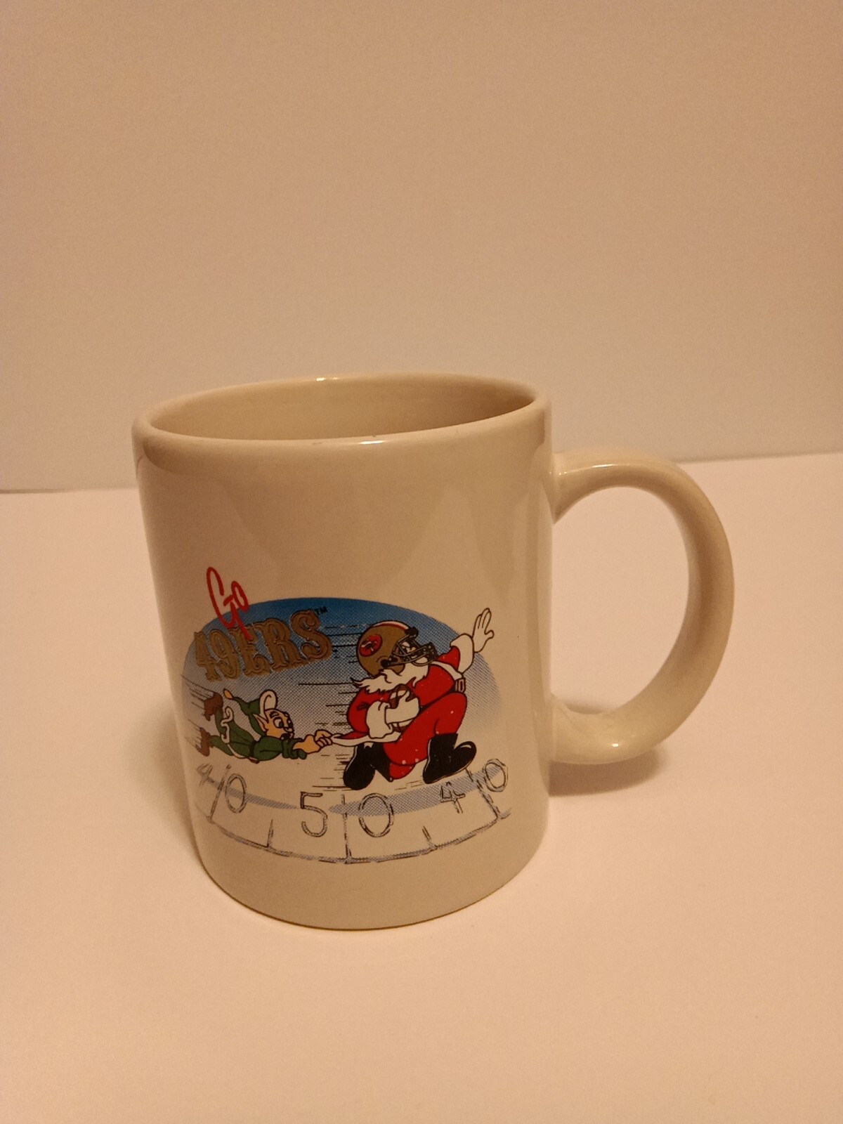 San Francisco 49ers Christmas Coffee Mug. Unbranded. Elf Chasing Santa ...