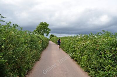 Photo 6x4 Mid Devon : Countryside Road & Jogger Cotteylands A jogger is ...