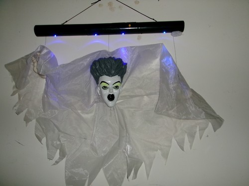 Halloween Gemmy floating ghost, lights up blue and talks. In great ...