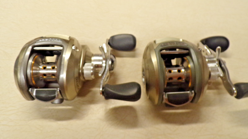 2 - BASS PRO SHOPS FISHING REELS - PRO QUALIFIER ( 7:1:1 & 6:4:1 GEAR ...