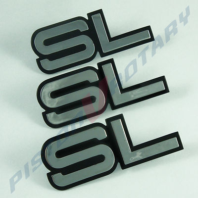 SL Front Guard & Boot Badges x3 , Chrome , NEW for LC LJ LH LX Torana ...