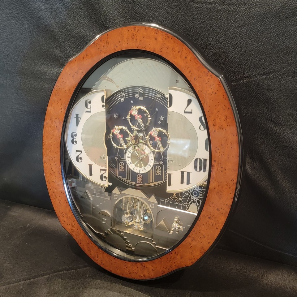 Rhythm Small World Oak Timecracker Sound & Magic Motion Clock 4MH752 ...
