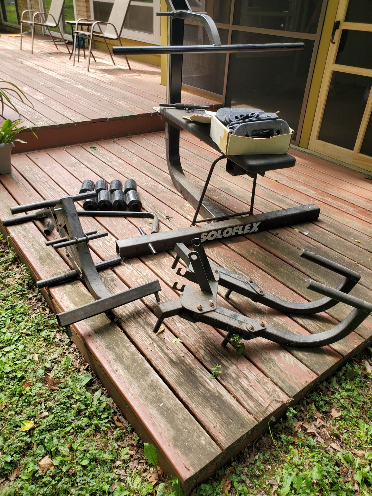 Soloflex home gym, weight bands, bench, leg ext., butterfly ext ...