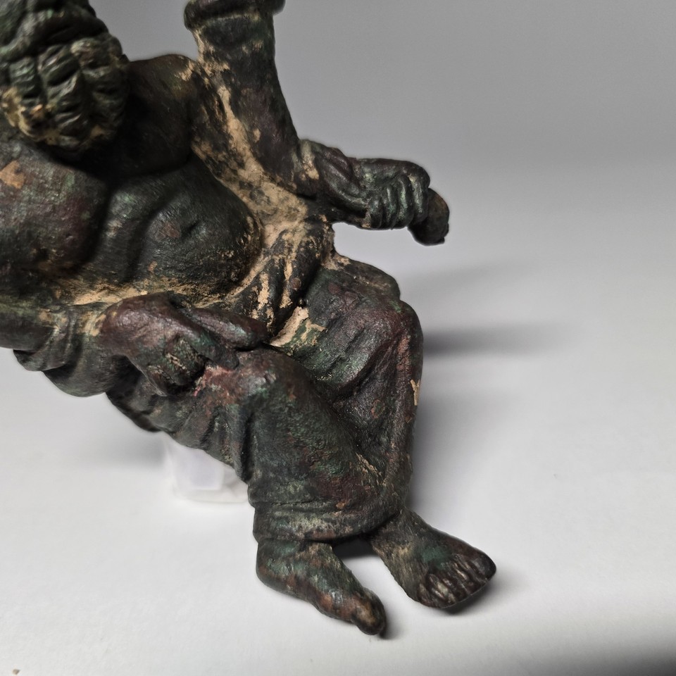AN IMPORTANT ROMAN BRONZE STATUE OF A SEATED BEARD MAN HOLDING VESSEL ...