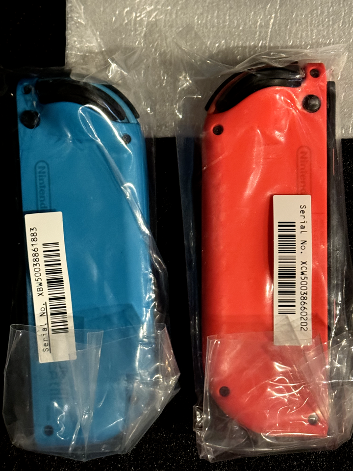 NEW Nintendo Switch Joy-Con Controllers NEON RED/BLUE with Grip and ...