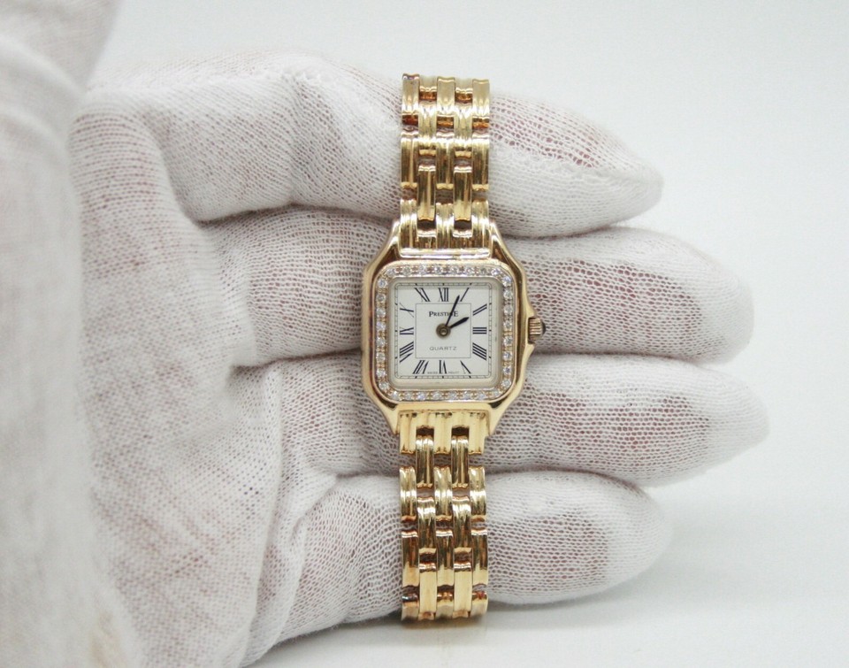 LADIES PRESTIGE 14K YELLOW GOLD QUARTZ SWISS MADE DIAMOND BEZEL 23MM ...