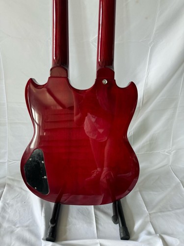 Double headed bright red electric guitar, perfect, made of peach ...