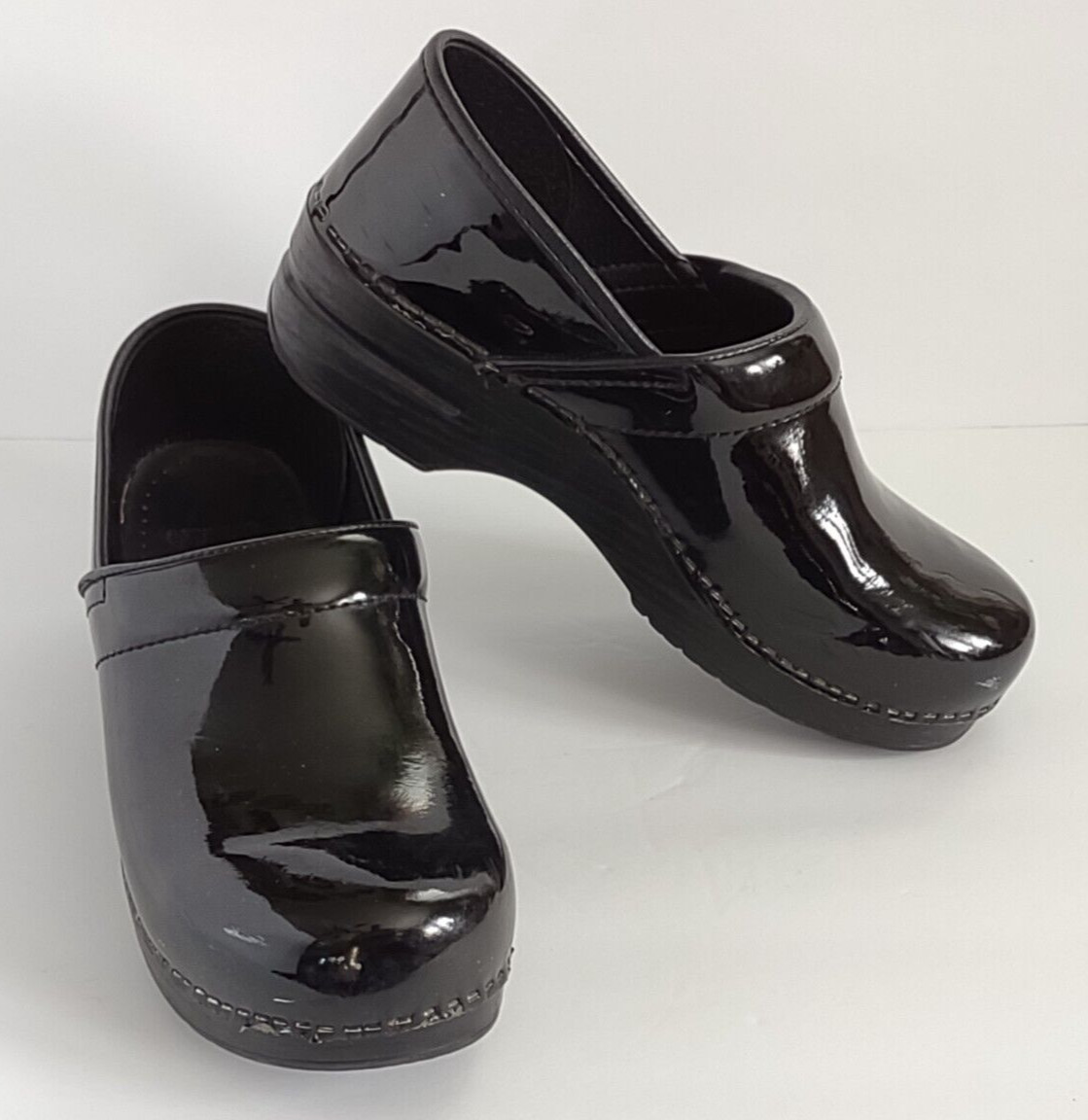 Dansko black shiny patent leather slip on shoes ladie… - Gem