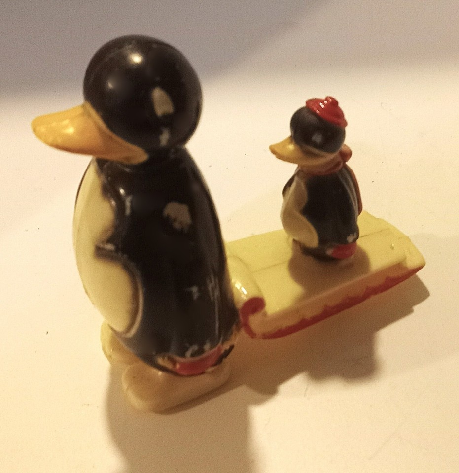Vintage Penguins Ramp Walker, Pulling young one on sled. | eBay