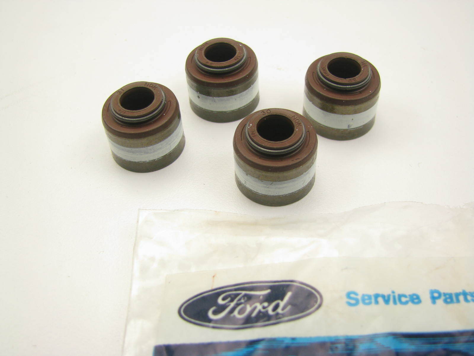 (4) NEW - OEM Ford E7ZZ-6571-A Engine Valve Stem Seals | eBay