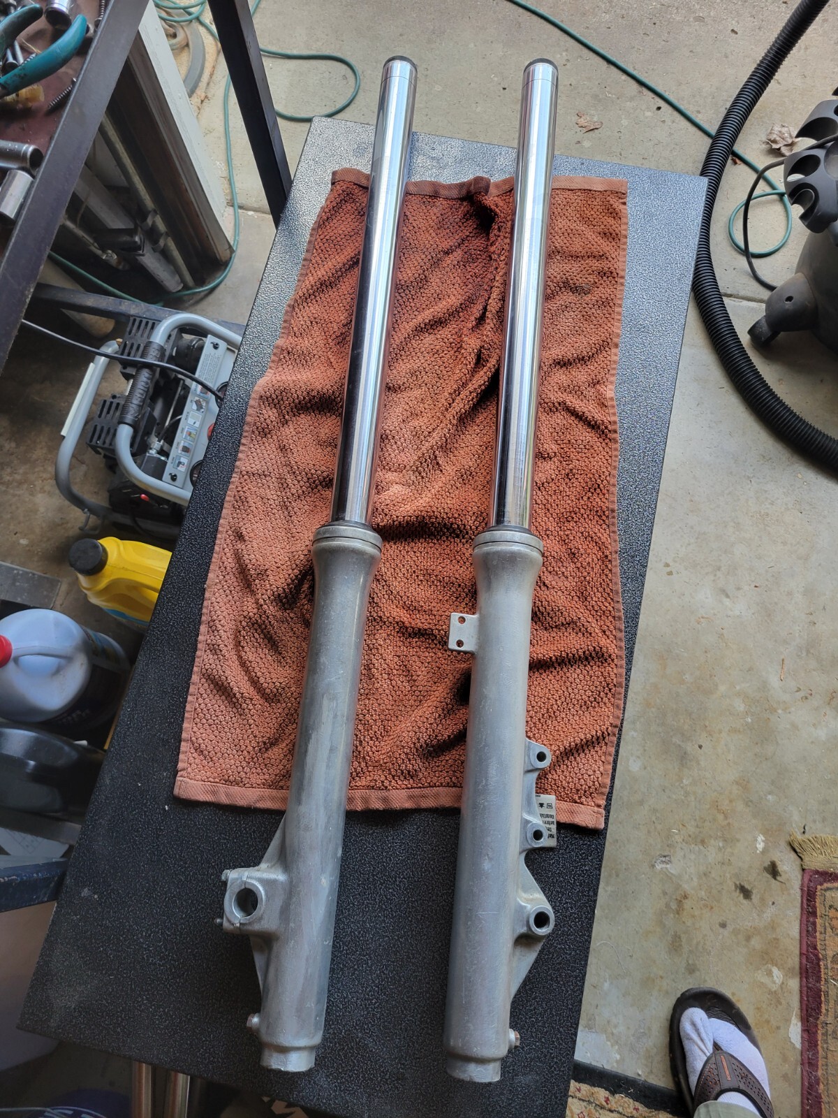1985-86 Honda ATC 250R front forks used straight .Corner of garage long ...
