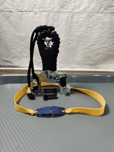Yellow pull back band slingshots with survival cord on handle | eBay