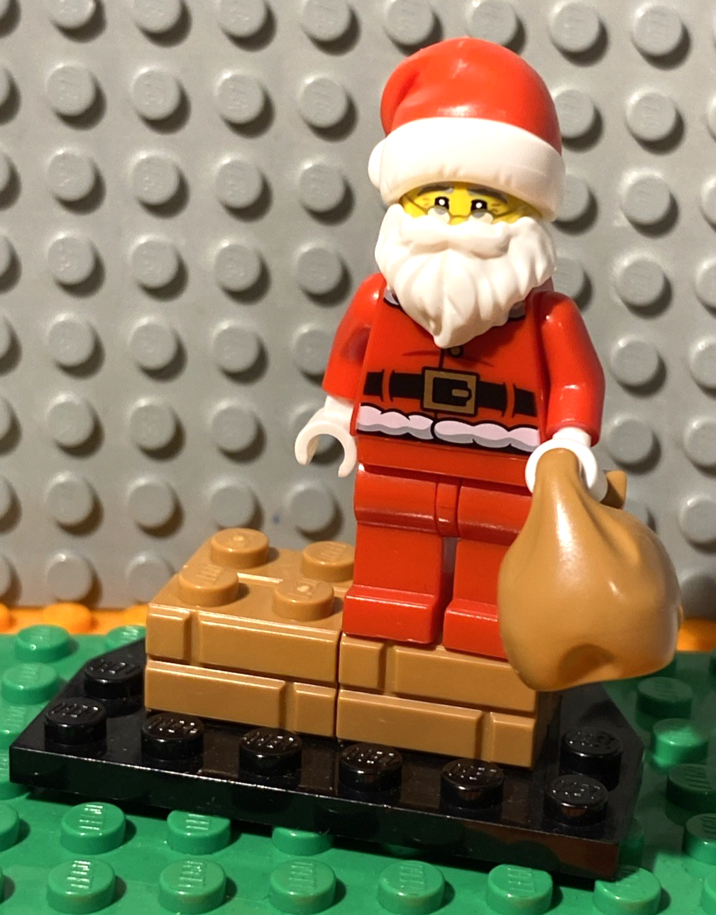 Lego Minifigure Santa Claus, Father Christmas on a chimney pot ...