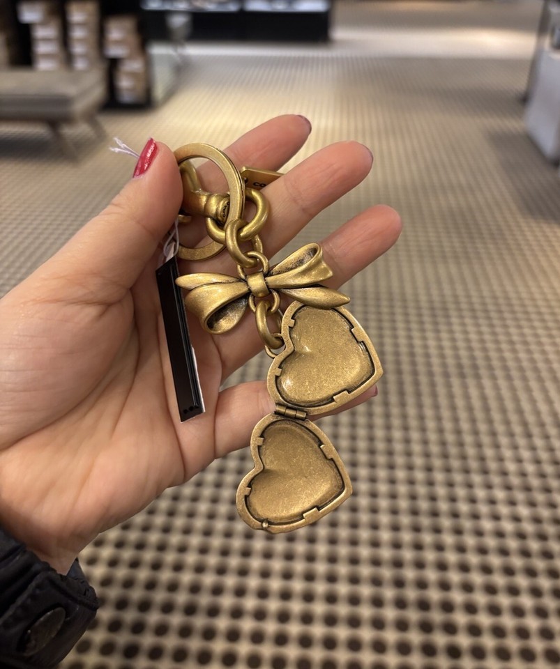 NWT Coach Bow Heart Locket Bag Charm, Brass/Ruby | eBay