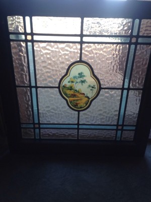 Antique Stain Glass Window With The Center Portrait Of Trees And Water ...