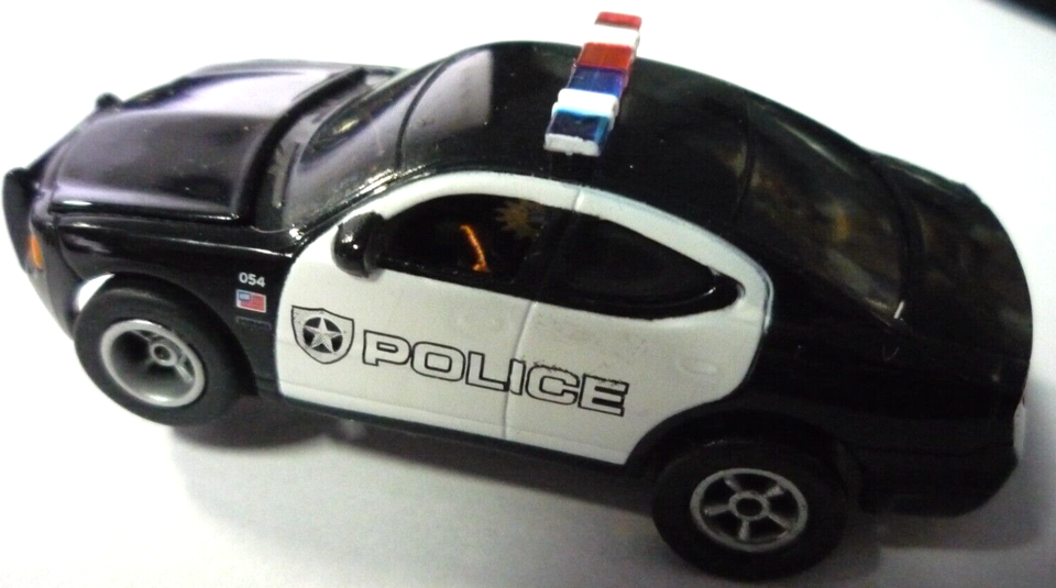 AUTO WORLD POLICE DODGE CHARGER HO Slot Car Xtraction running chassis ...