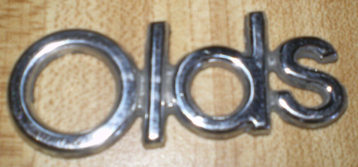 Oldsmobile (Olds) Script Emblem EUC Stick-on, USA, Chrome Finish, 2 1/4 ...