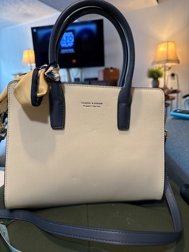 Leather, cream color purse with blue handles, trim and shoulder strap ...