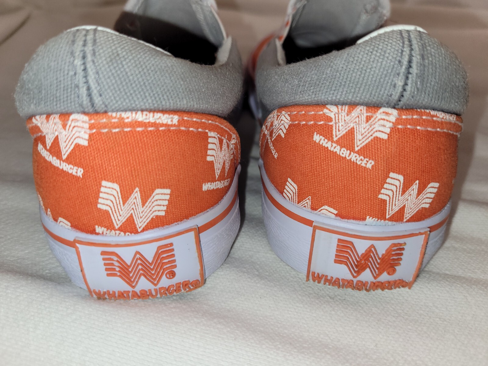 WHATABURGER LOGO TEXAS BRAND ORANGE CANVAS SLIP ON SI… - Gem