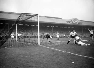 Desperate leap by Bristol Rovers goalkeeper Ron Nicholls as ba - 1958 ...