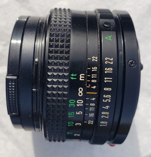 Canon & Promaster Spectrum 7 Lenses 50mm 1:1.8 S.C. Lens & 70-210mm FD ...