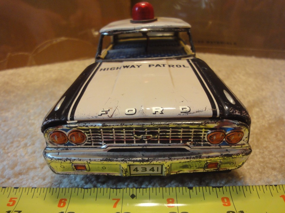 Vintage battery operated tin toy Chevy Impala Highway Patrol Police car ...