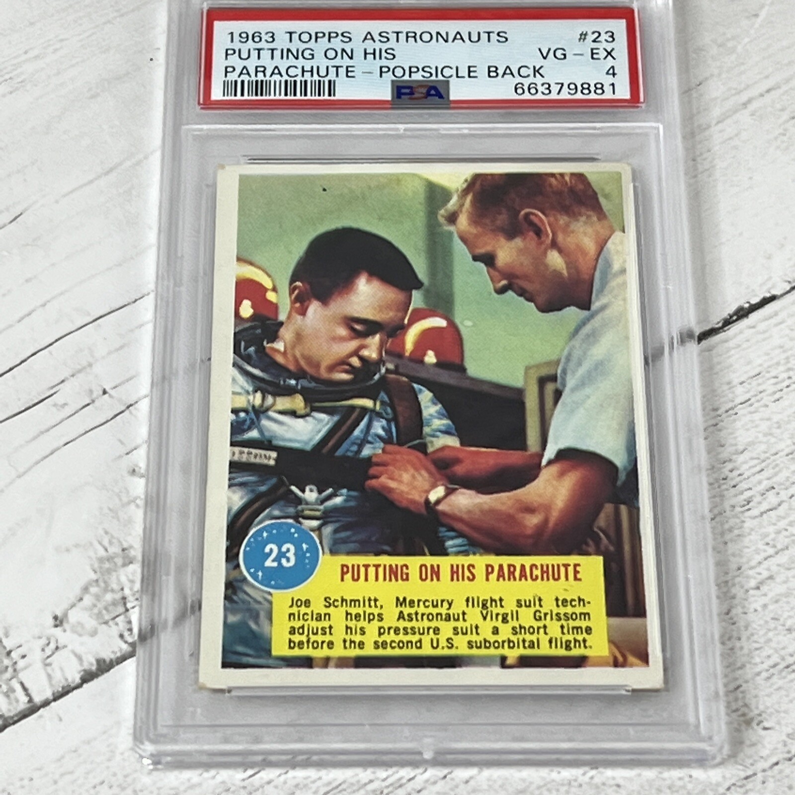 1963 Topps Astronauts #23 Gus Grissom Putting on his parachute PSA 4 ...