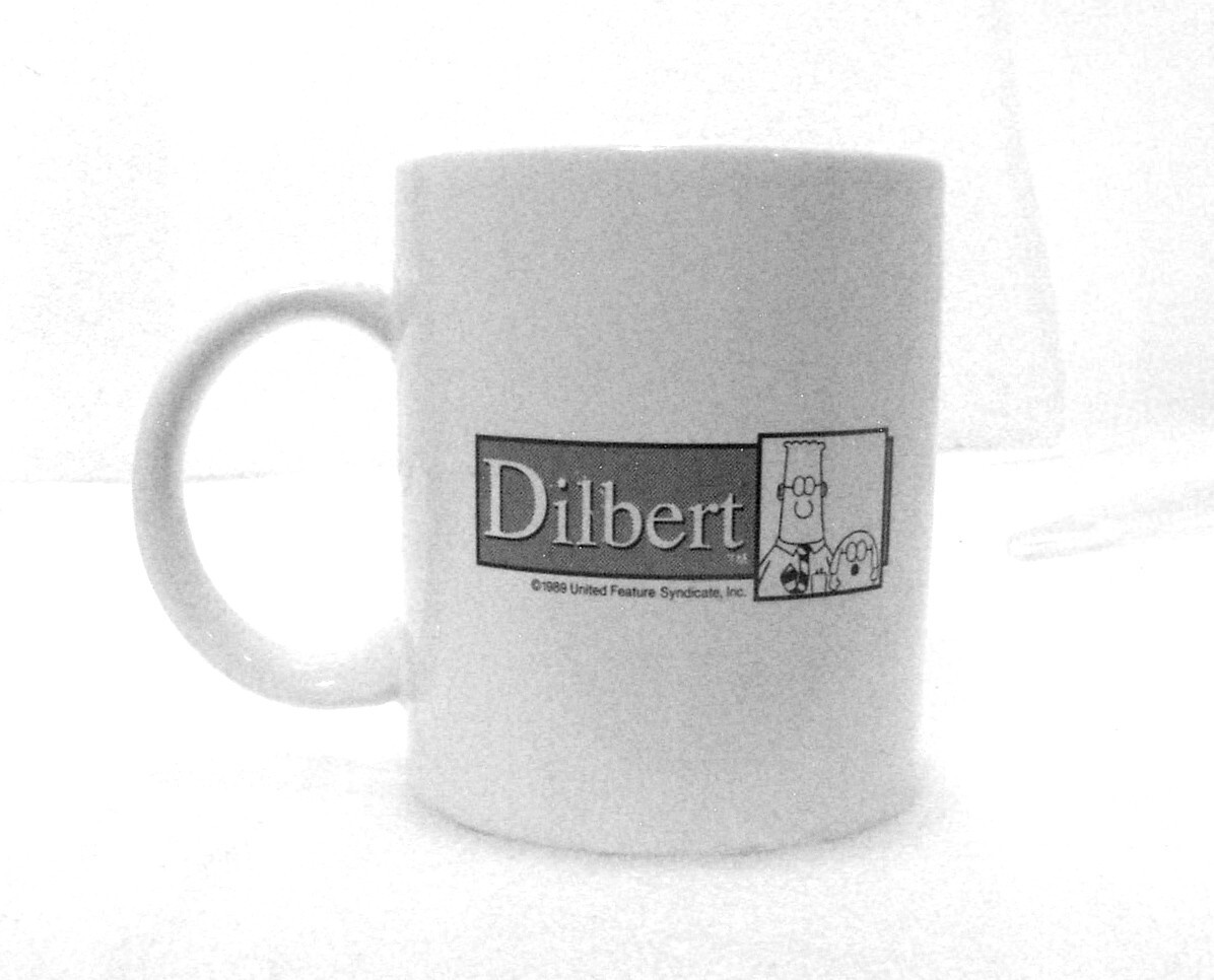 Vintage Dilbert Mug “Out! St. Dogbert Casts out the Demons of Stupidity ...