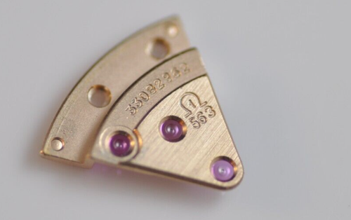 Omega watch movement part 563-1003 part Train Wheel Bridge | eBay Australia