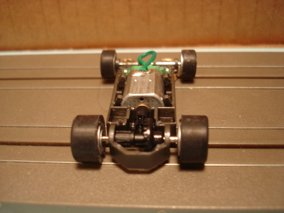 AFX RACING H.O. SCALE MEGA G+ 1.5 NARROW CHASSIS WITH CHROME 5 SPOKE ...