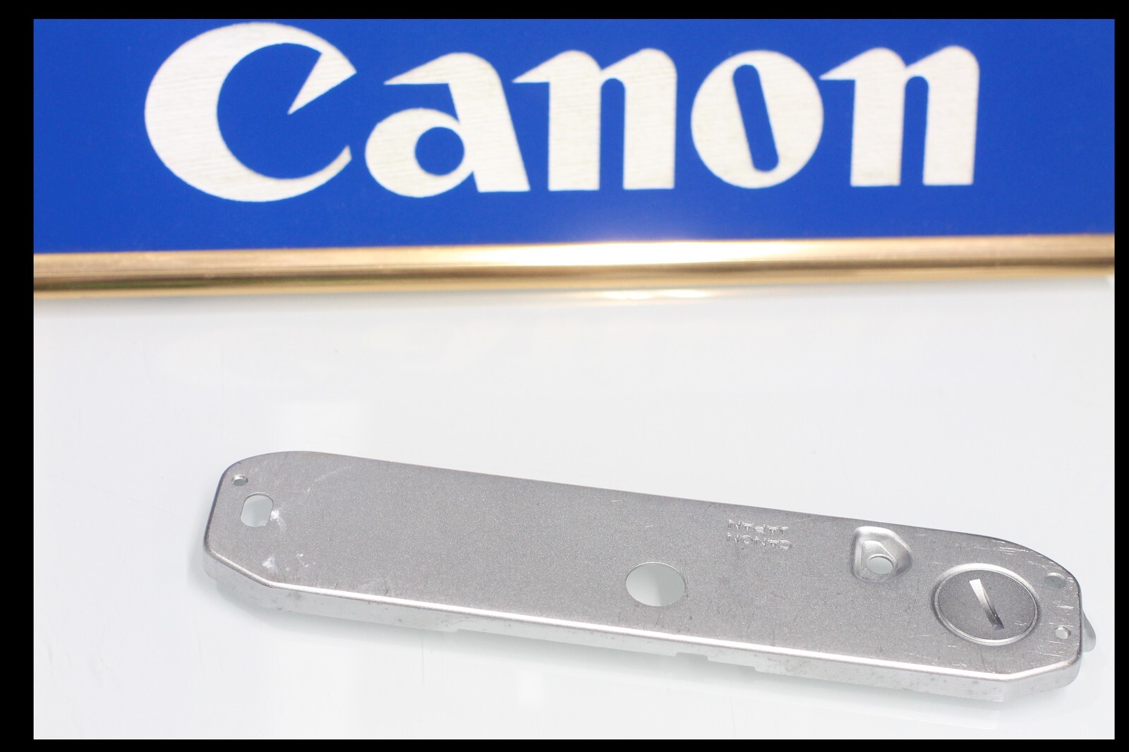 208322 CANON AE-1 BOTTOM COVER REPAIR PART USED AE1 AE 1 | eBay