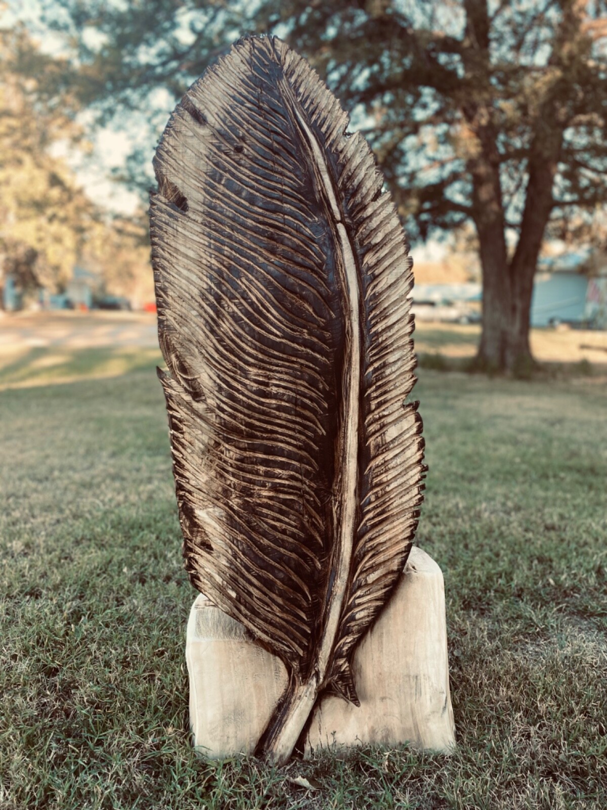 Feather chainsaw carving. 4ft tall. HEAVY. Made from a cottonwood tree ...