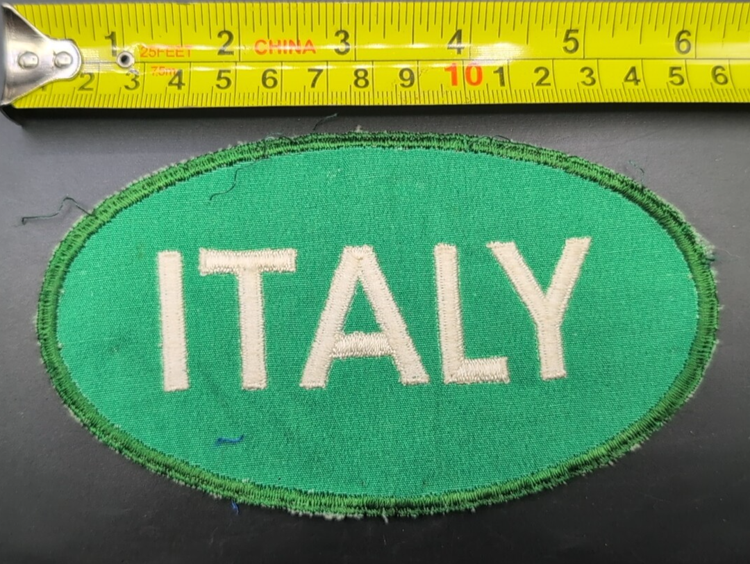 WWII/2 US Italian POW white on green and light and dark green oval ...