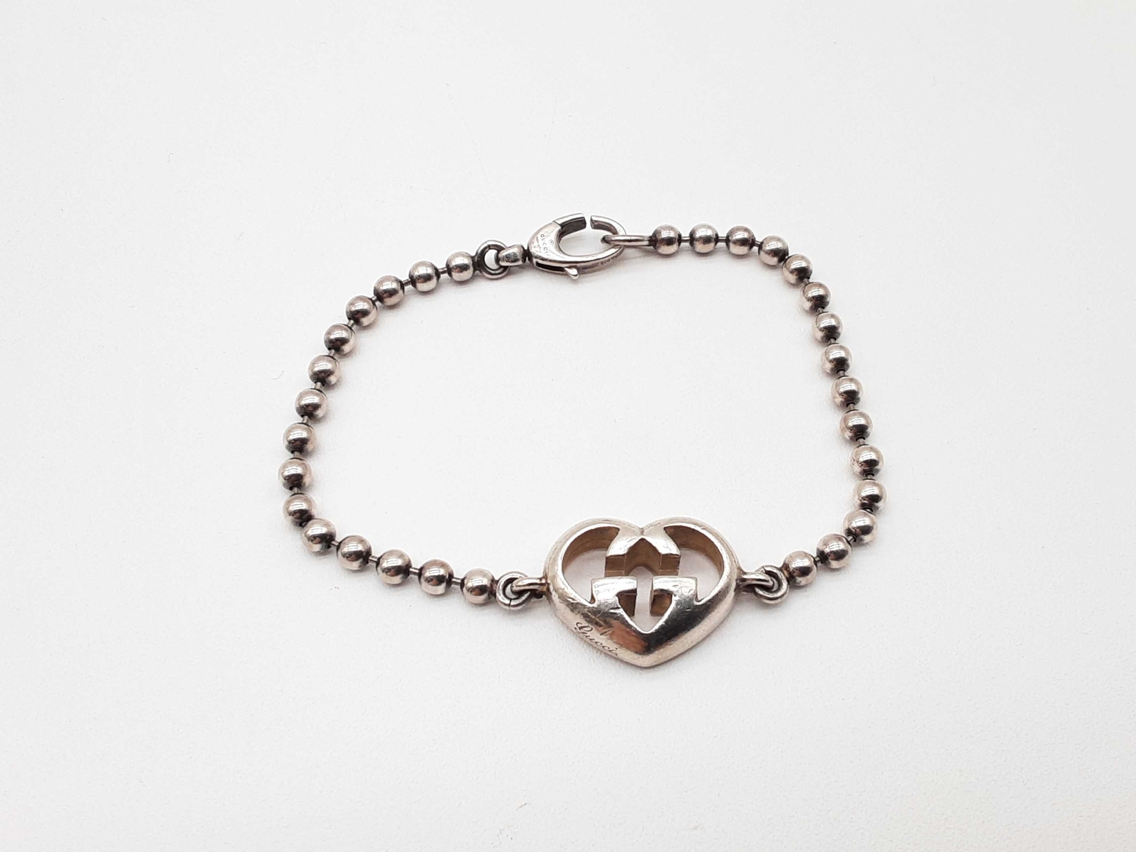 Gucci Sterling Silver Interlocking Logo Heart Bracele… - Gem