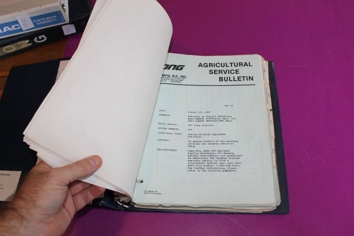 Binder Full of Long Agricultural Service Bulletins. There are tabs for ...