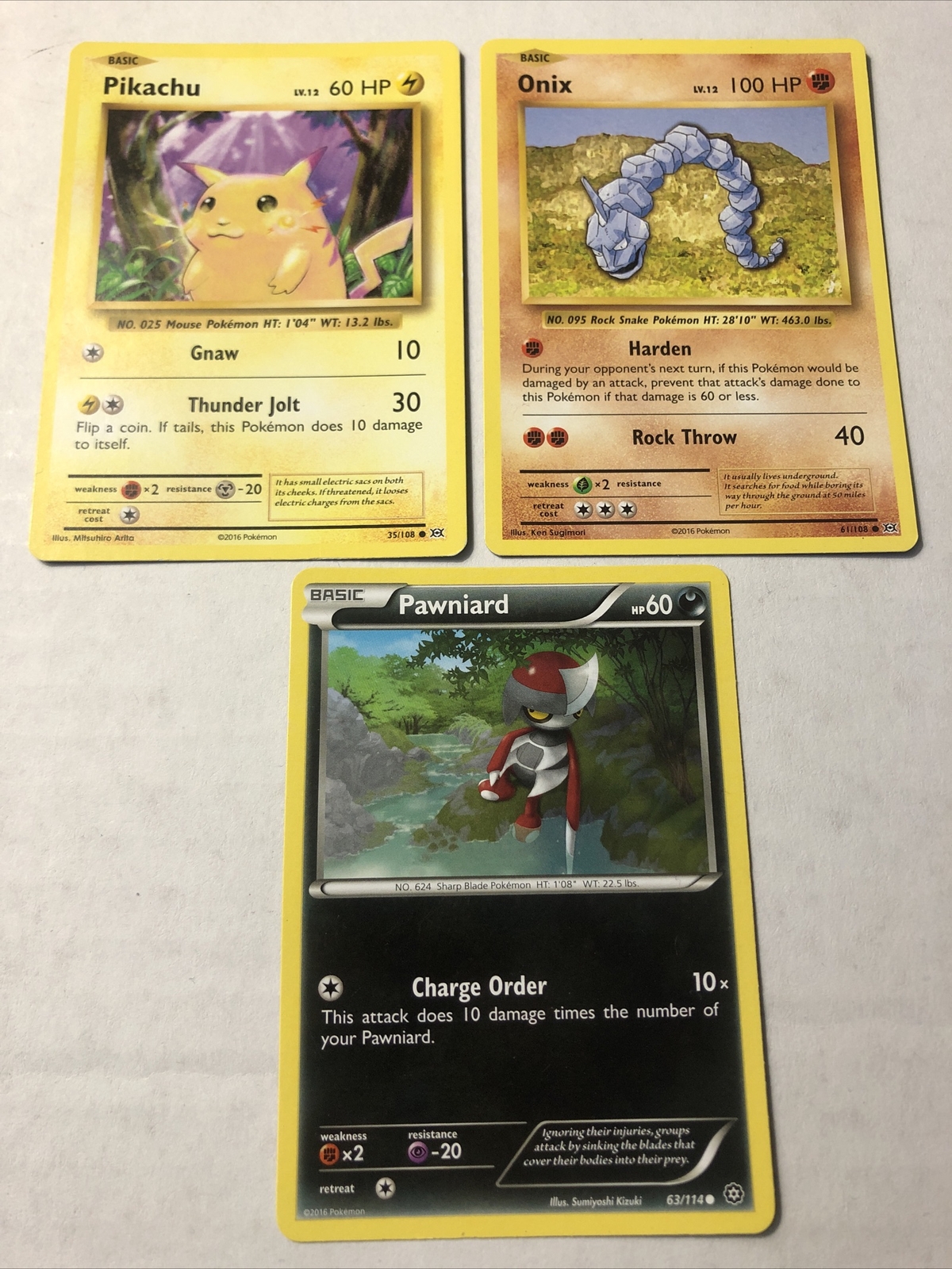 Pikachu and Onix 2016 Pokemon Common Cards - Evolution + 2016 Pawniard ...