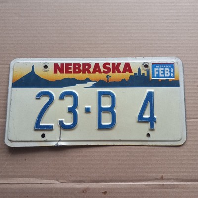 1996 Nebraska License Plate - "23-B 4" (blue on white) FEB 96 Sticker ...