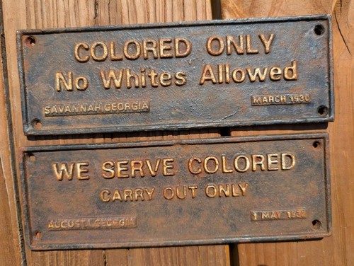 2 CAST IRON SEGREGATION SIGNS WE SERVE COLORED CARRY OUT COLORED ONLY ...
