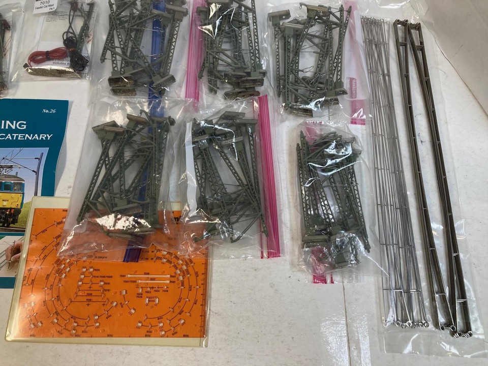 Marklin HO Catenary Lot. (60) Masts, (30) 14" Wires, (2) Feeder Masts ...