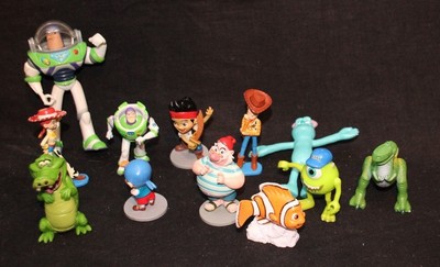 LOT OF 12 DISNEY FIGURES TOY STORY BUZZ FINDING NEMO DORI JAKE PIRATES ...