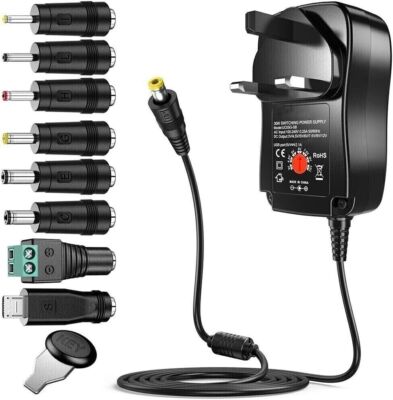 Universal 3-12V Adjustable Voltage Adaptor Charger USB AC/DC Power ...