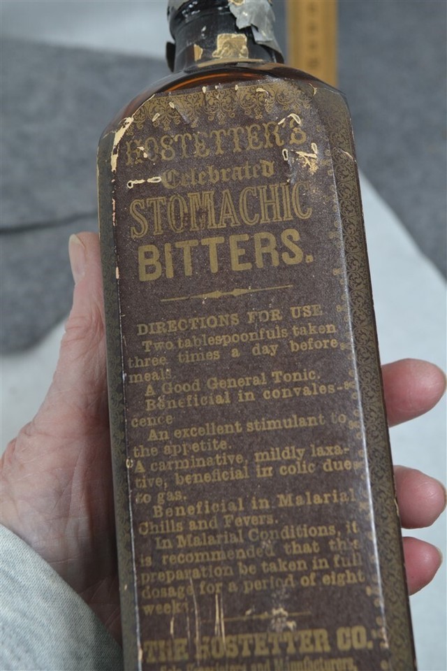 antique quack medicine bottle w/label Stomach Bitters cure colic ...