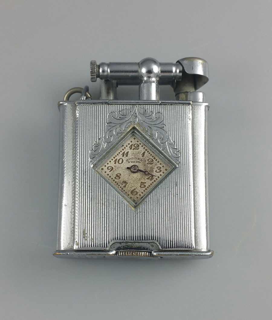 VINTAGE GOLDEN WHEEL LIFT ARM WATCH LIGHTER | Grelly USA