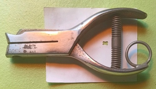 Vintage RAILROAD Conductor Ticket Punch .. WITH A DOG BONE SHAPED PUNCH ...